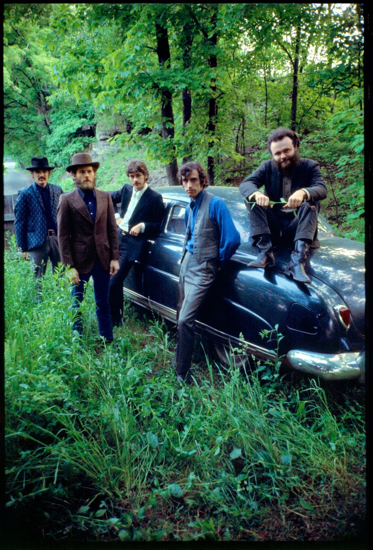The Band, outside Big Pink, posing with his Hudson, Woodstock, NY, 196